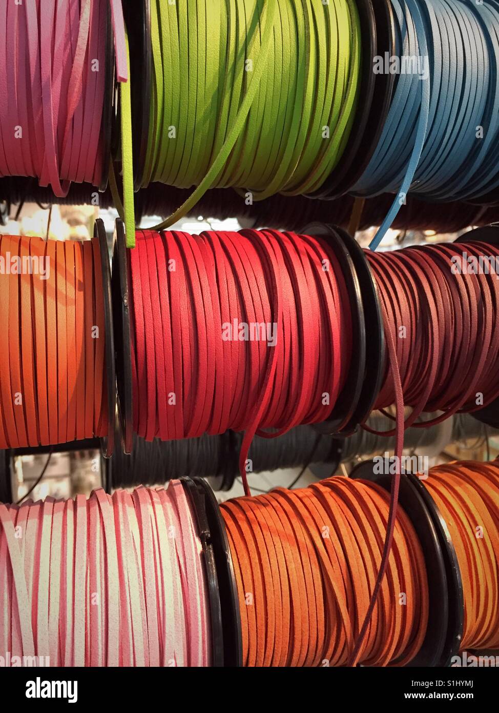 Spools of fabric cords, garment district, NYC, USA Stock Photo - Alamy