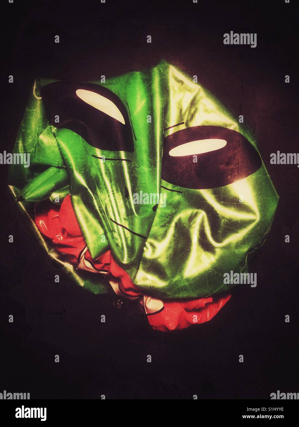 Deflated blow-up alien Stock Photo - Alamy