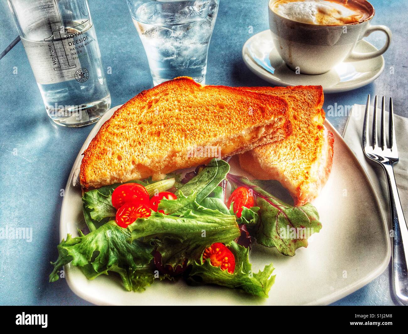 Waitrose Cafe cheese and ham toasted sandwich with cappuccino coffee ...