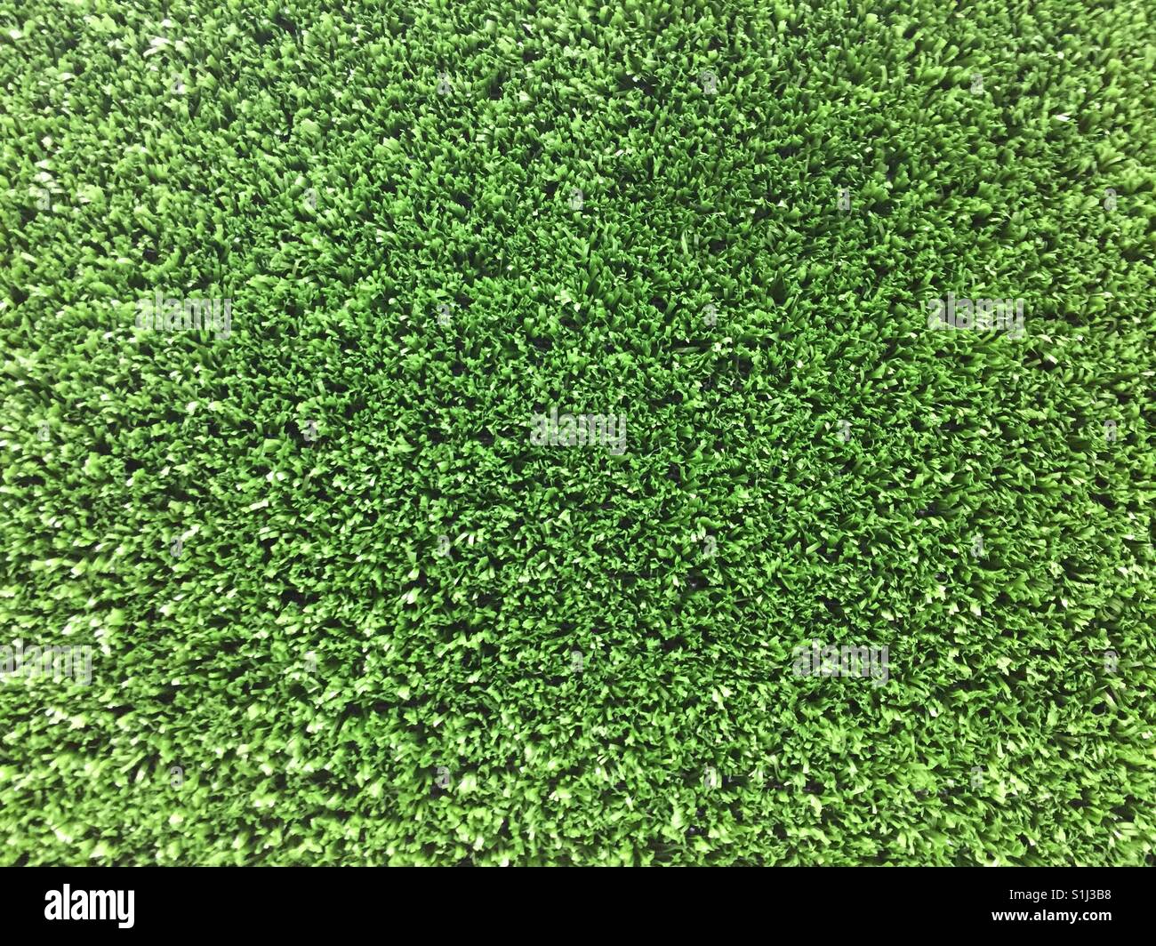 Artificial grass background Stock Photo - Alamy