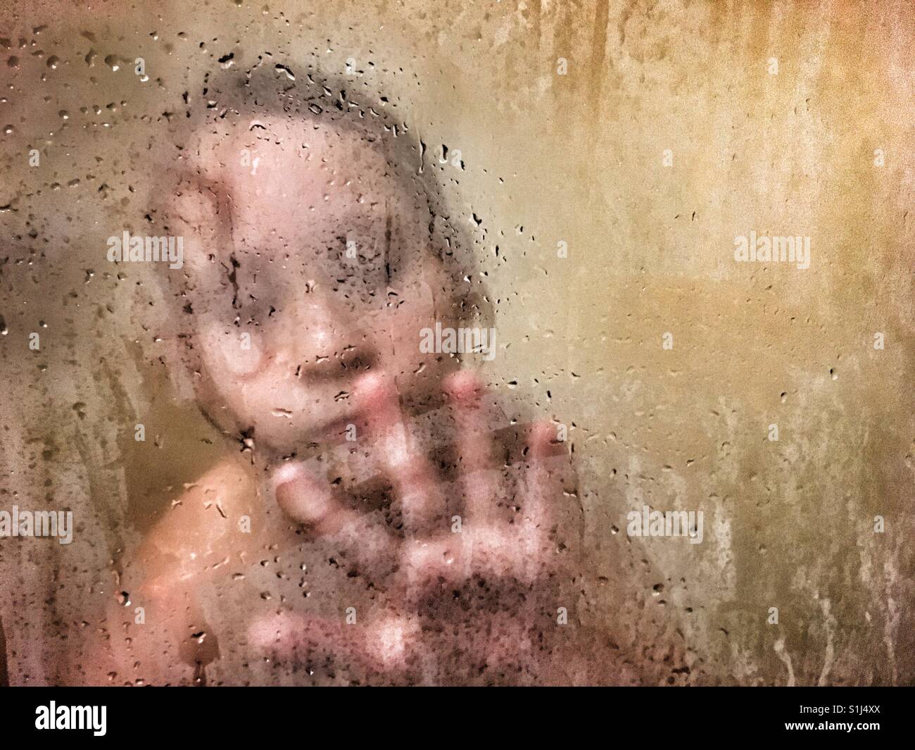 Child playing in the shower Stock Photo - Alamy