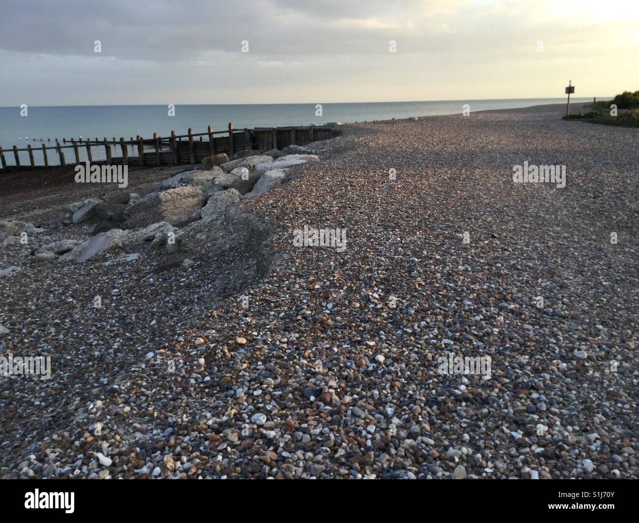 Flat sea with rocks hi-res stock photography and images - Alamy