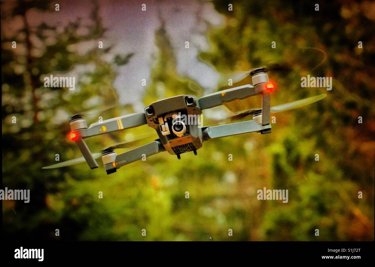 Flying a drone Stock Photo - Alamy