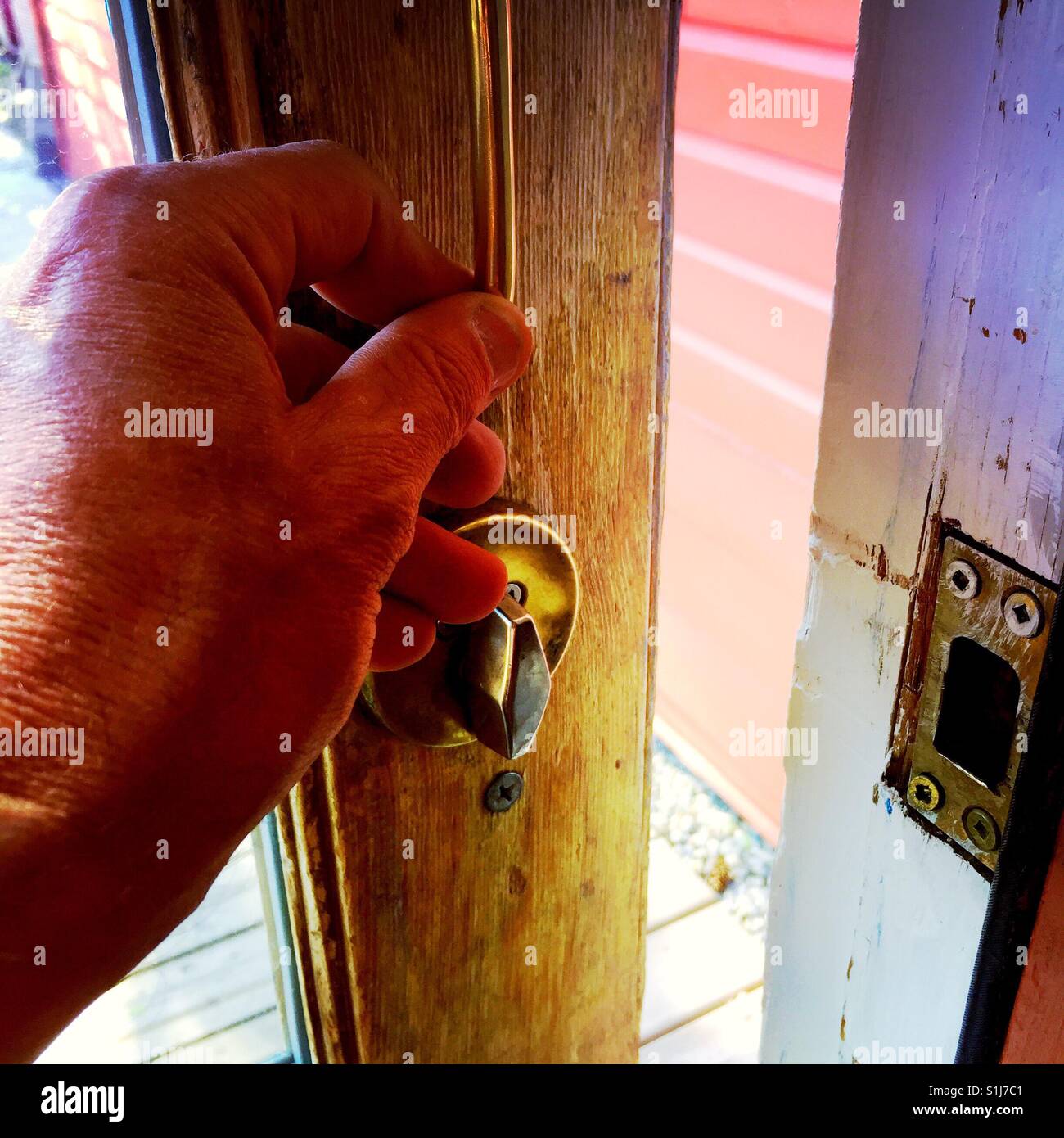 Man hand pushing door hi-res stock photography and images - Alamy