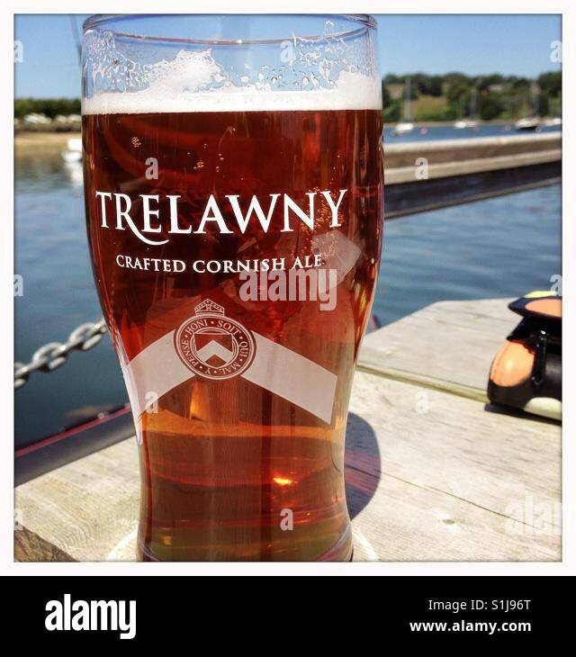 A pint of Cornish traditional ale with a view Stock Photo - Alamy
