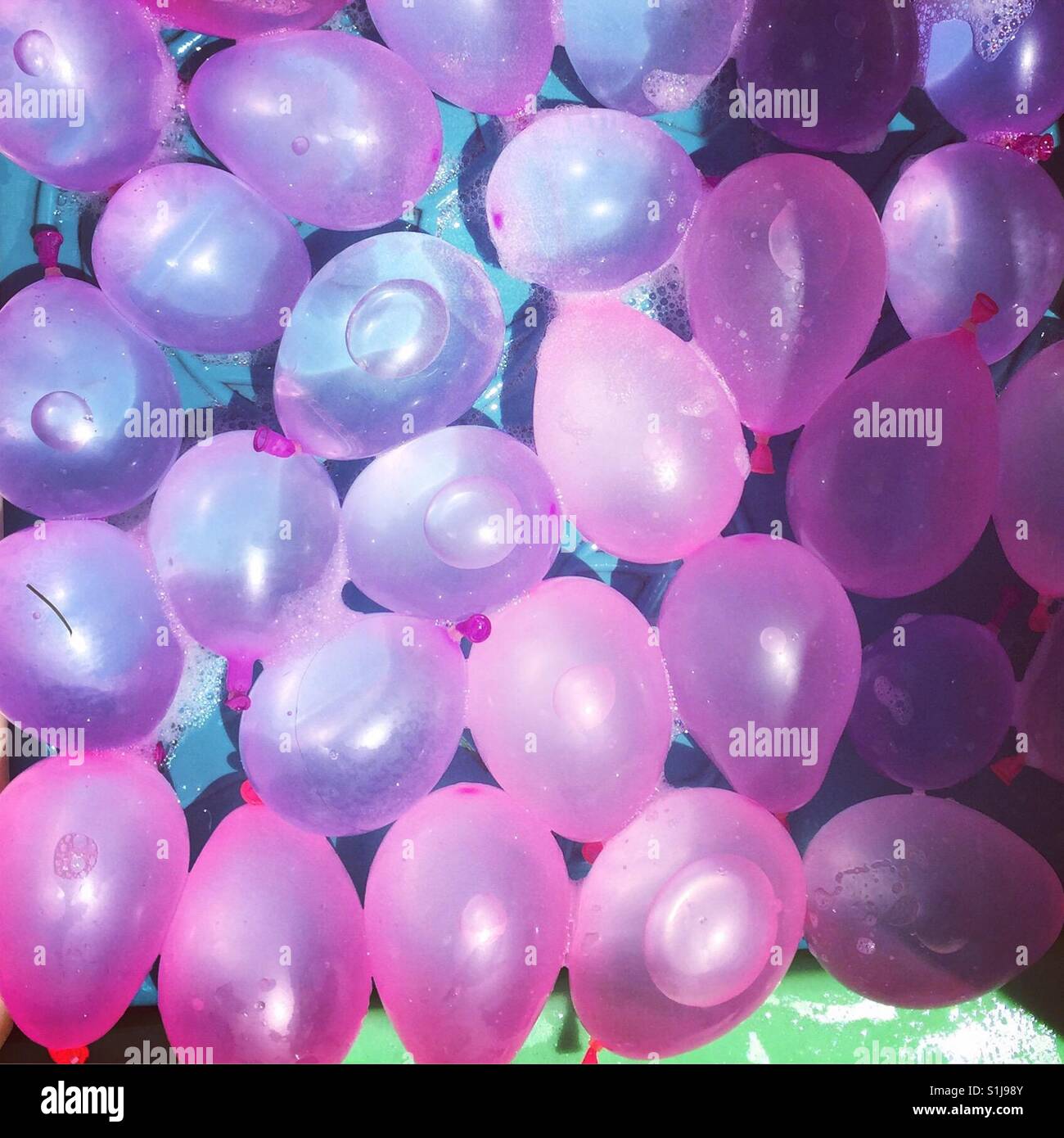 Popping balloons hi-res stock photography and images - Alamy