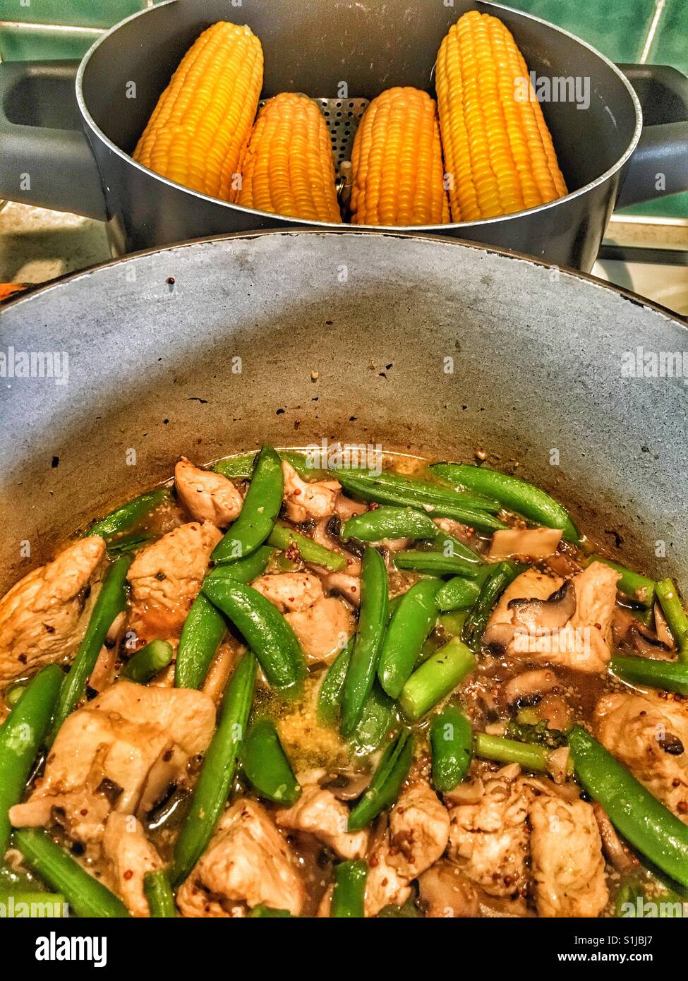 Cooking no supper on the hob Stock Photo - Alamy