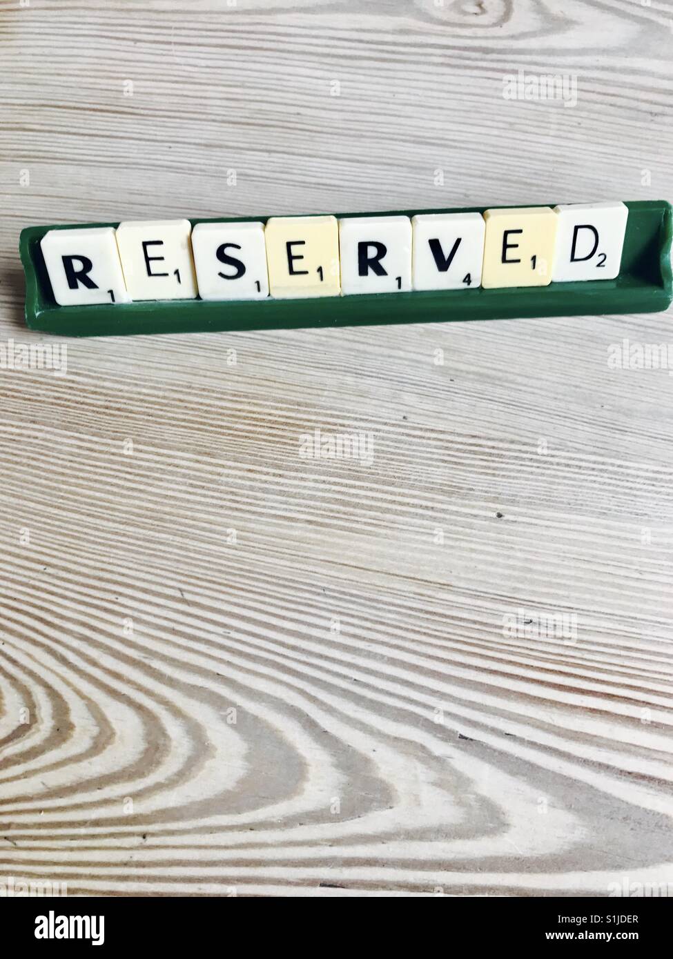 In scrabble letters hi-res stock photography and images - Alamy