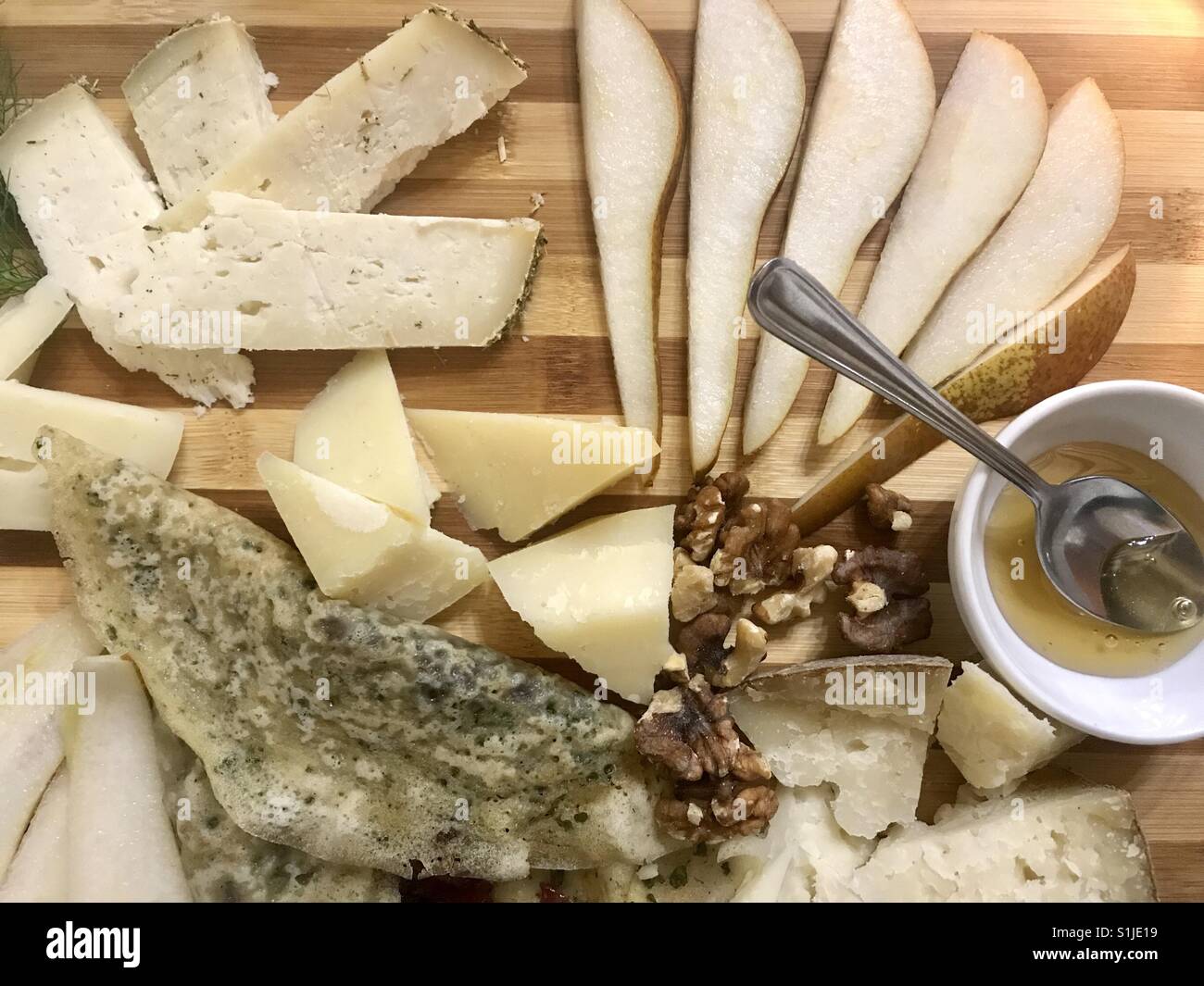 Appetizer of various Italian chess with honey and a Piadina filled with ...