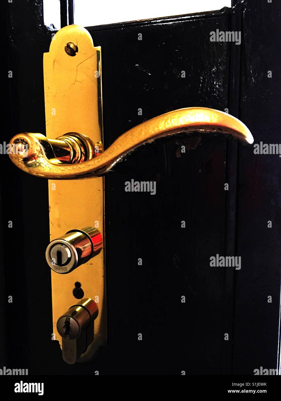 Golden door handel Stock Photo - Alamy