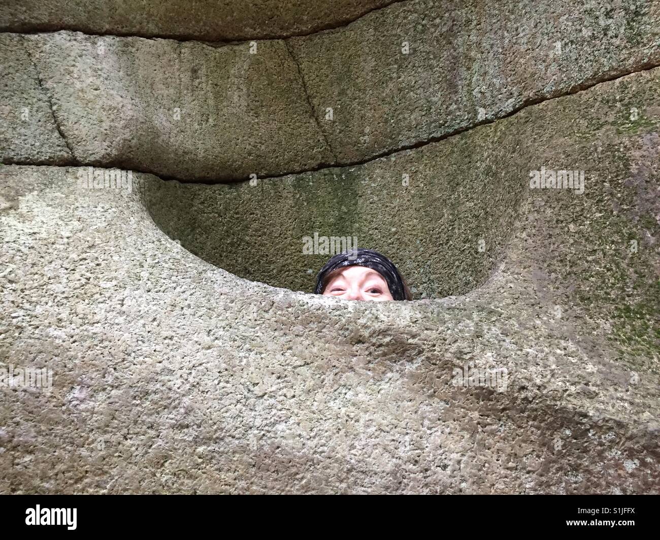 Rock with a hole hi-res stock photography and images - Alamy