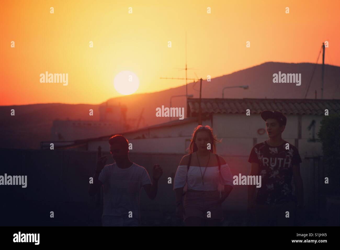 Youth at sunset hi-res stock photography and images - Alamy