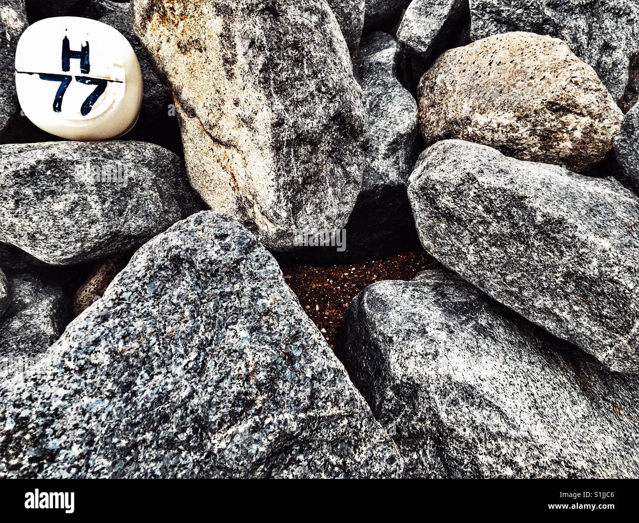 Rock armour coastal defences Stock Photo - Alamy