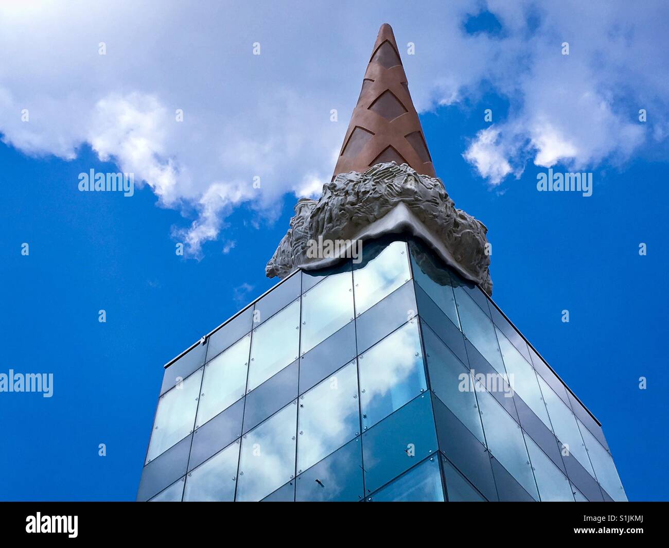 Dropped Cone sculpture on a building in Cologne, Germany Stock Photo ...