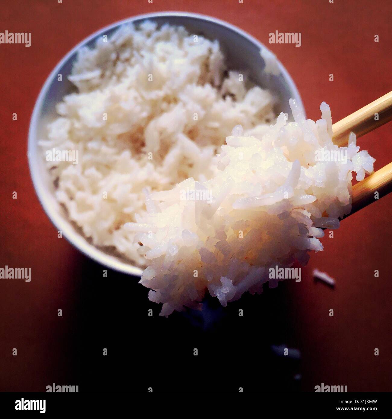 Holding bowl of rice hi-res stock photography and images - Alamy