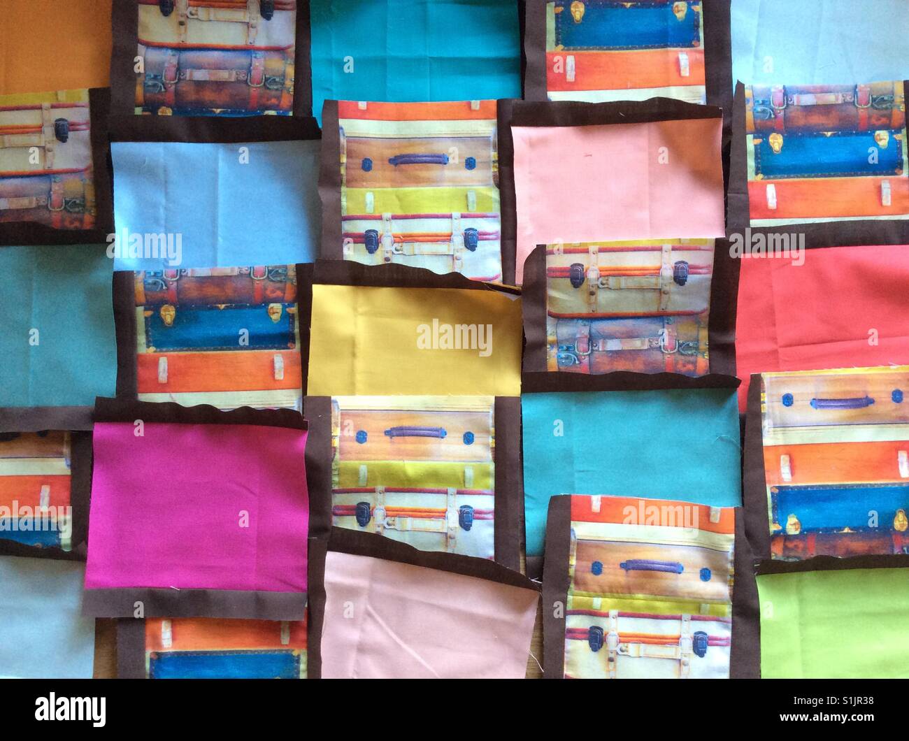 Back view of assembled fabric squares for a quilt Stock Photo - Alamy