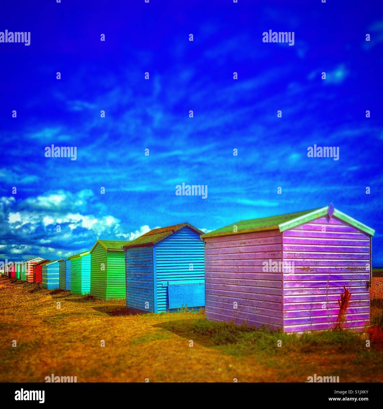Colourful beach huts Stock Photo - Alamy