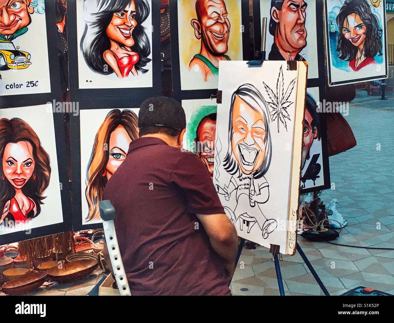 Artist drawing caricature caricatures hi-res stock photography and ...