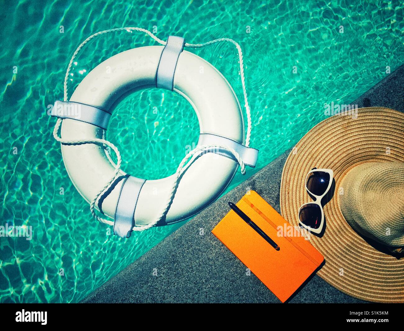How i would want to spend my vacation - by the pool with the book Stock ...