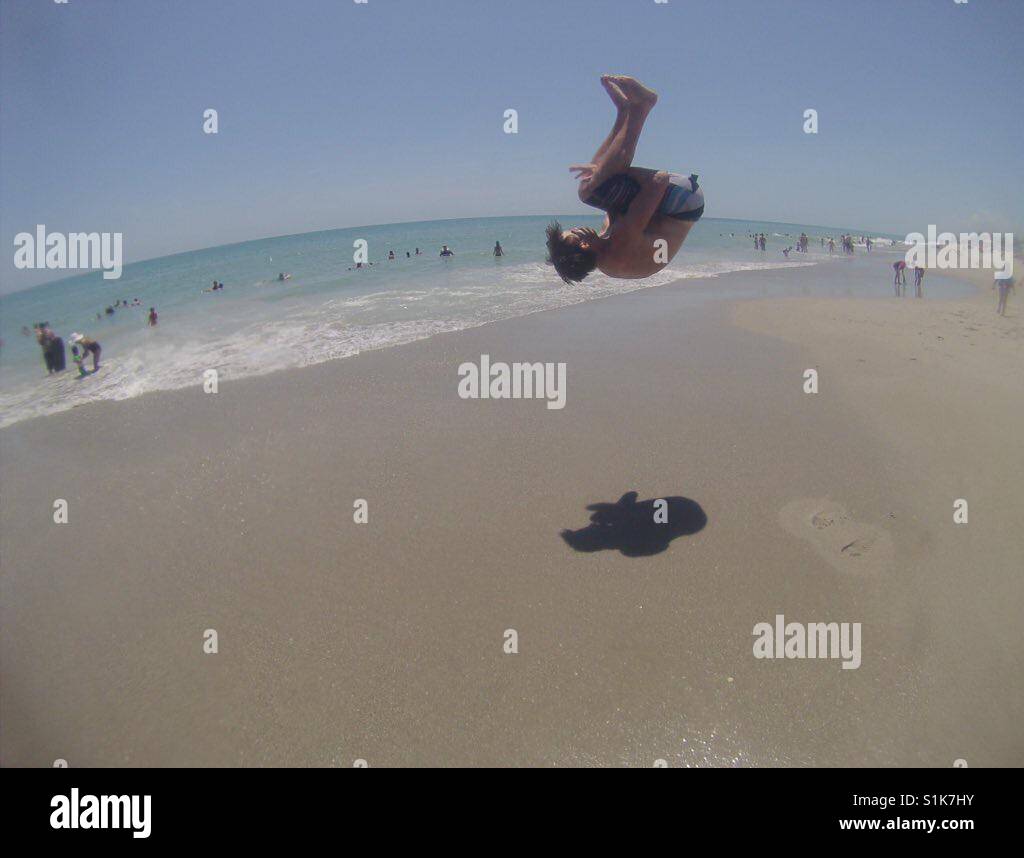 On backflip on beach hi-res stock photography and images - Alamy