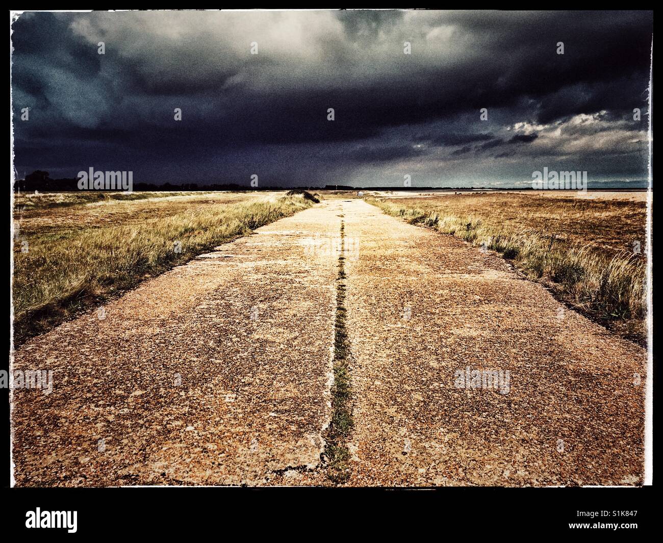 Wartime concrete road Stock Photo - Alamy