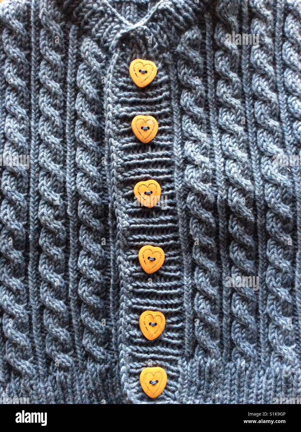 Sweater buttons hi-res stock photography and images - Alamy