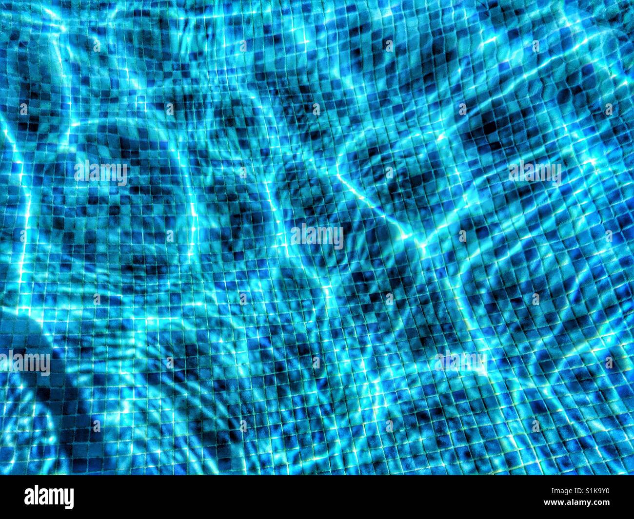 Light refraction and ripples in water of a swimming pool Stock Photo ...