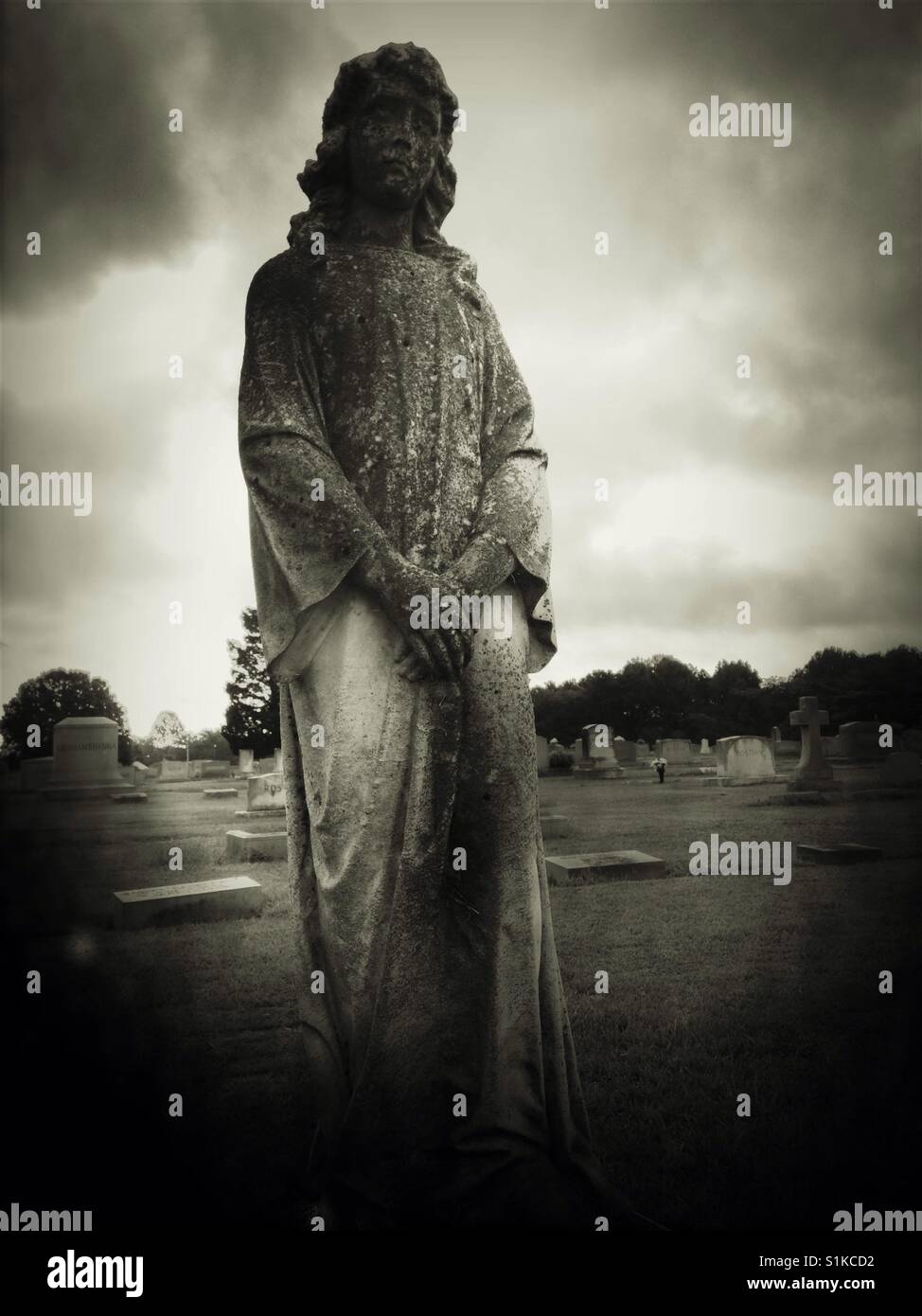 Mournful statue- grave marker in North Carolina Stock Photo - Alamy