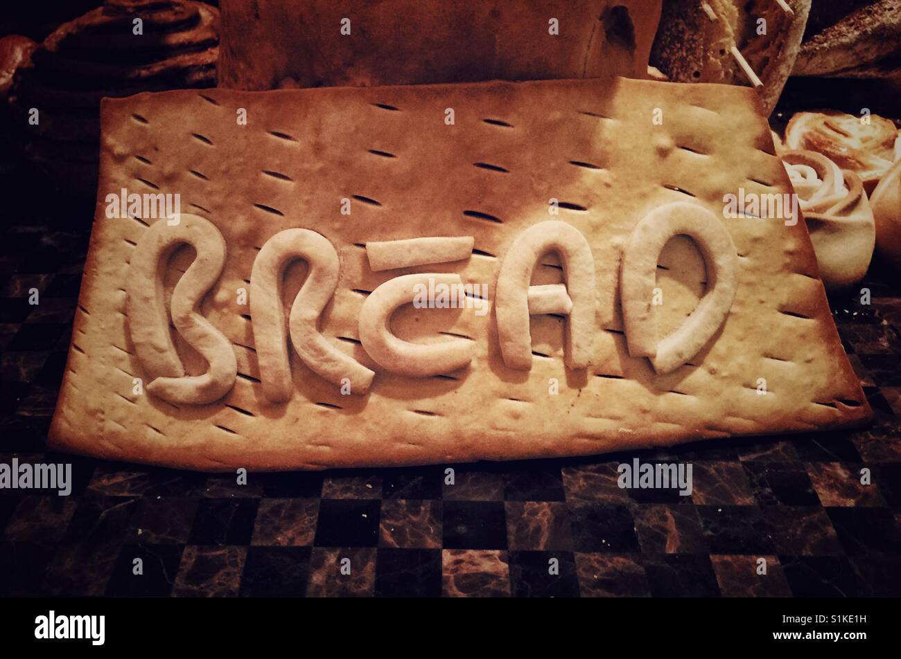 Word bread made out of dough Stock Photo - Alamy