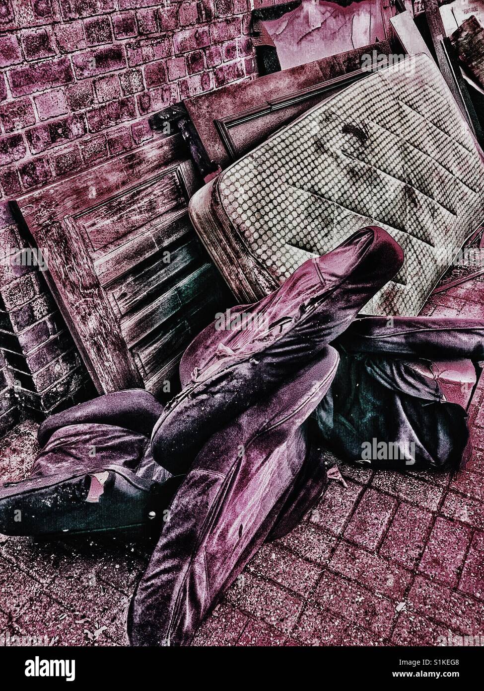 Dumped mattress and furniture fly tipping in street, London, England ...