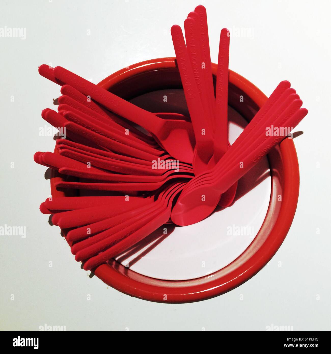 Red plastic forks Stock Photo - Alamy