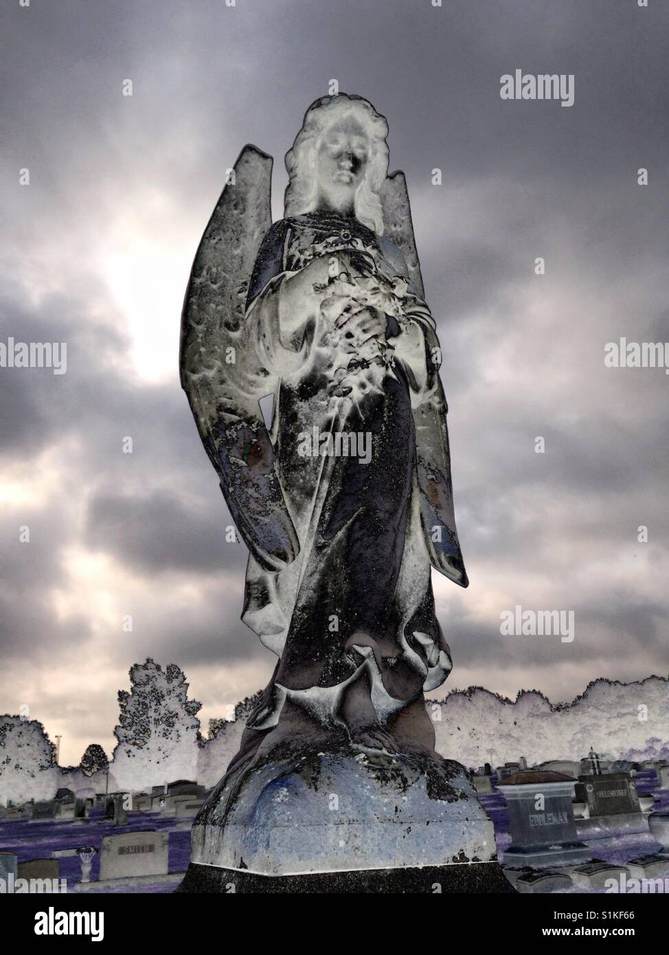 Inverted angel- special effect photo of grave marker angel in North ...