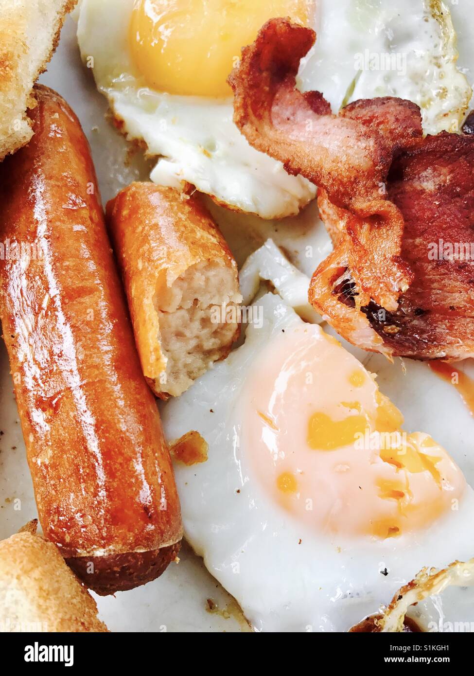 Eating a cooked breakfast Stock Photo - Alamy