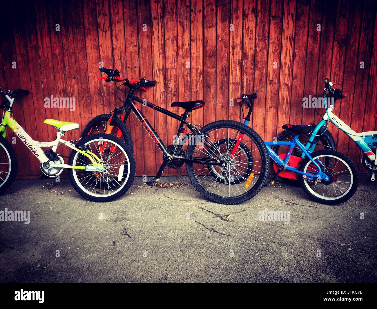 Many Bicycles different sizes all together Stock Photo - Alamy