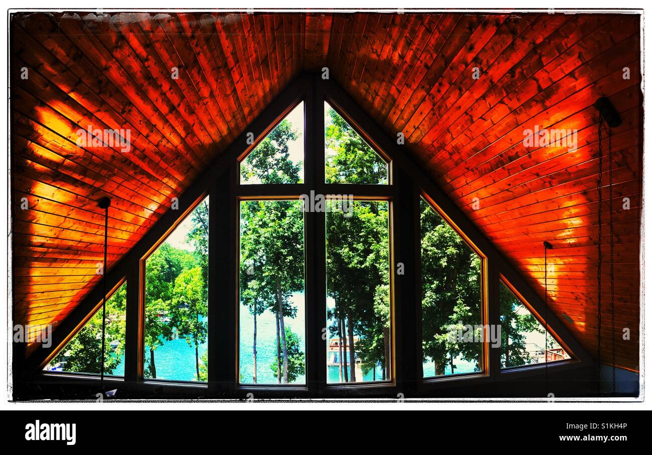Lakehouse loft window Stock Photo - Alamy