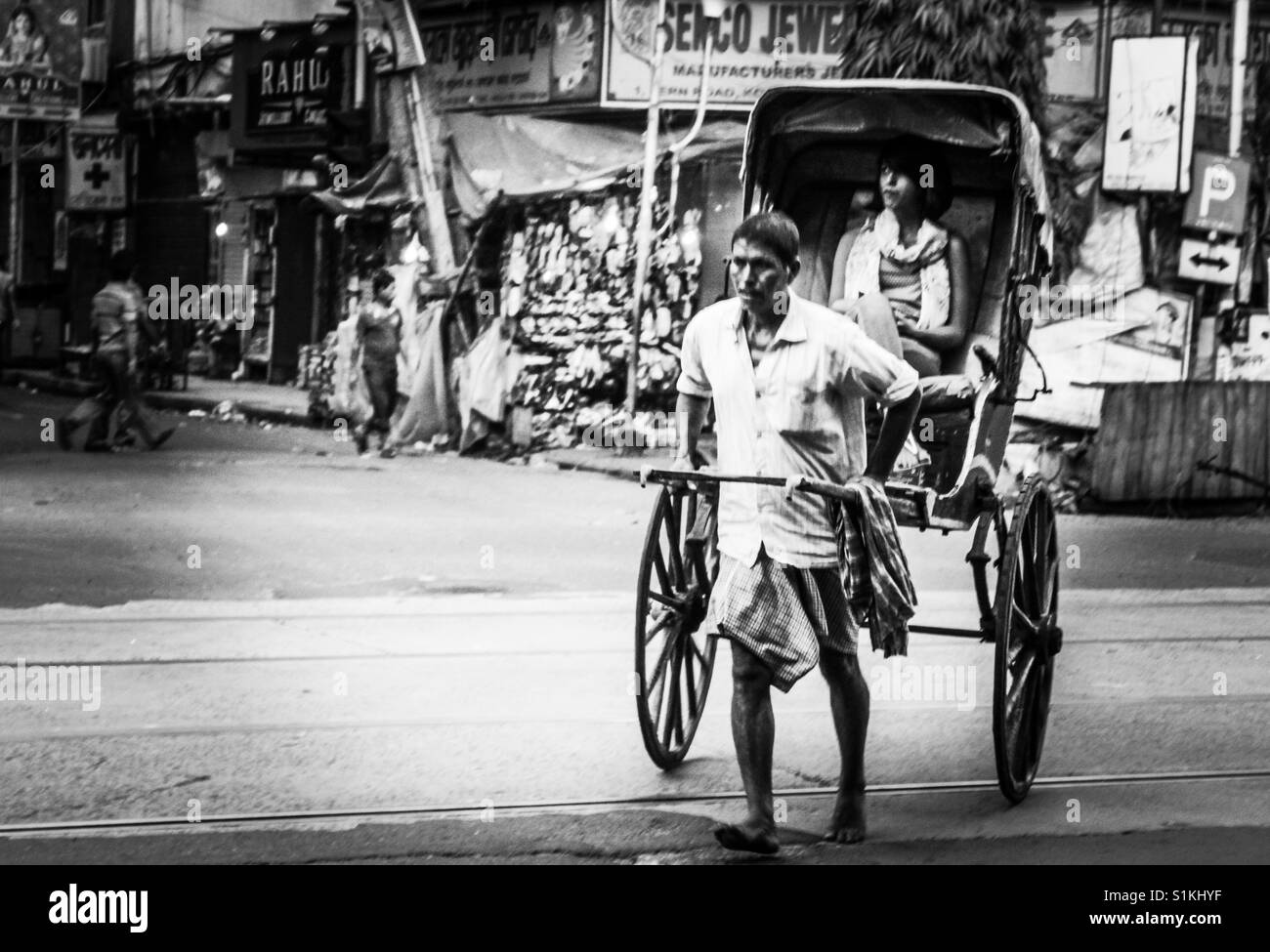 Hand pulled rickshaw Black and White Stock Photos & Images - Alamy