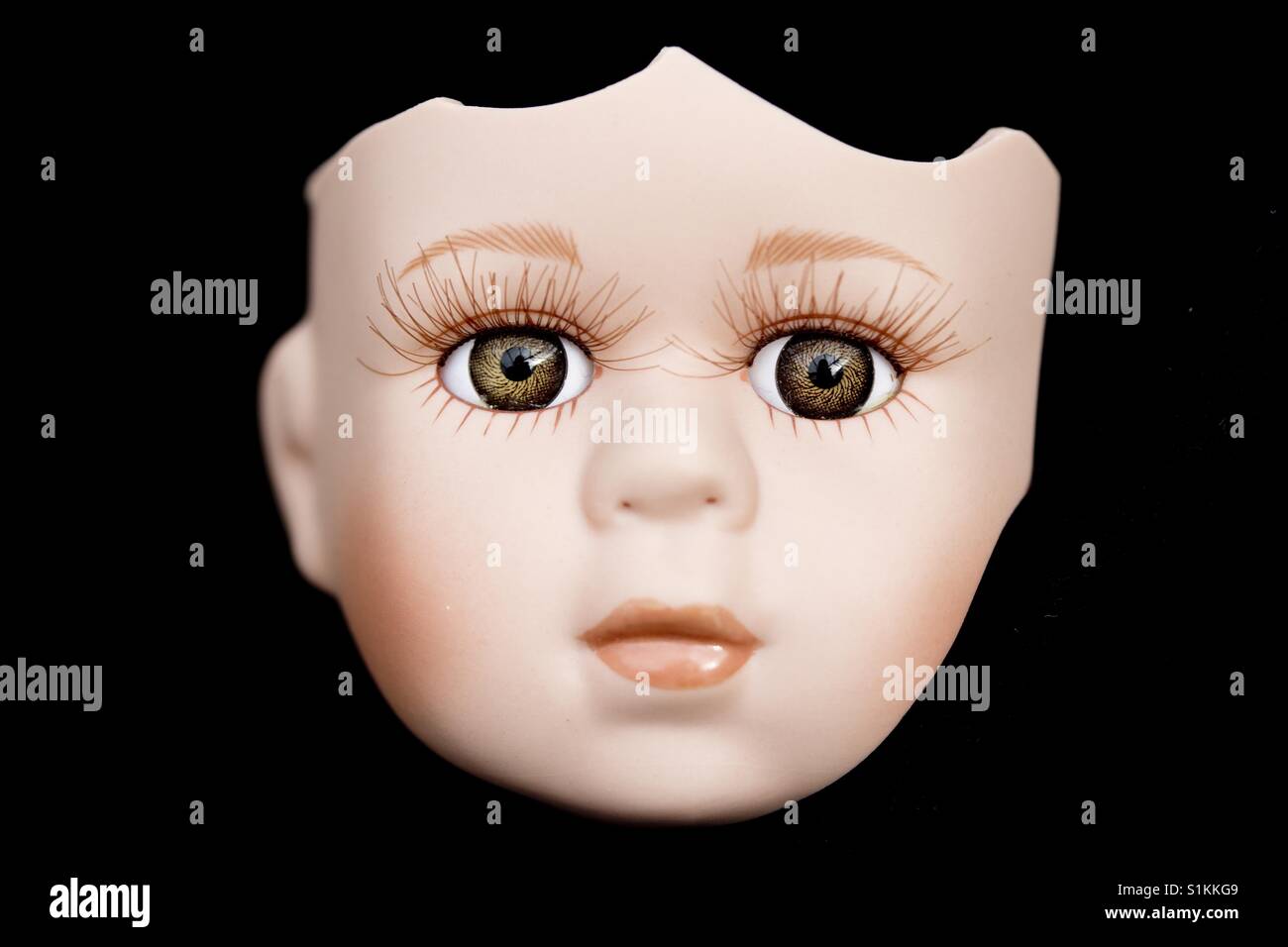 Damaged baby doll toy hi-res stock photography and images - Alamy