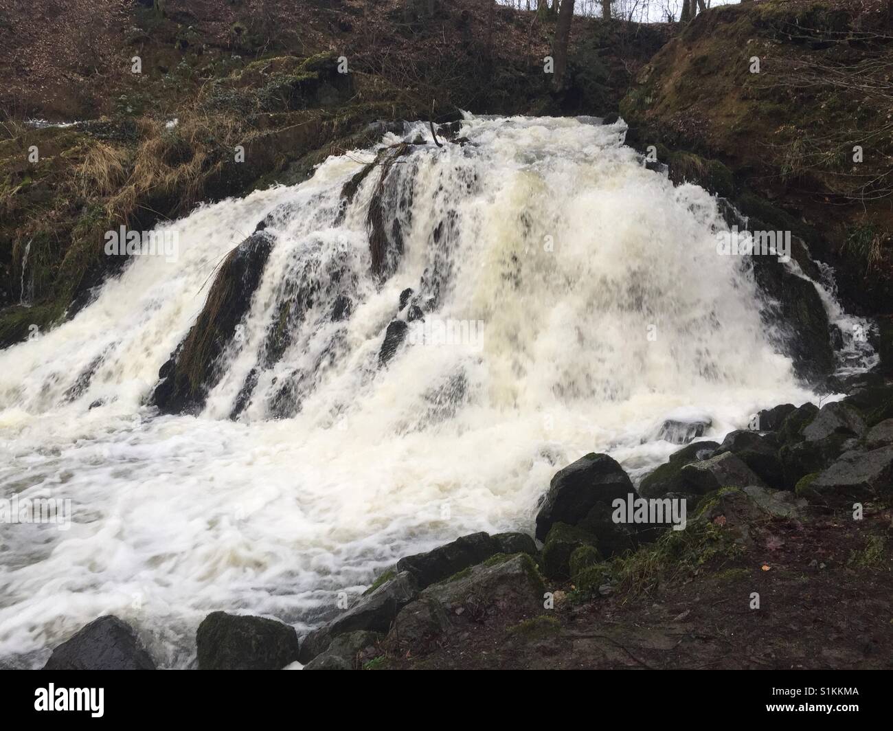 Waterfall during winter Stock Photo - Alamy