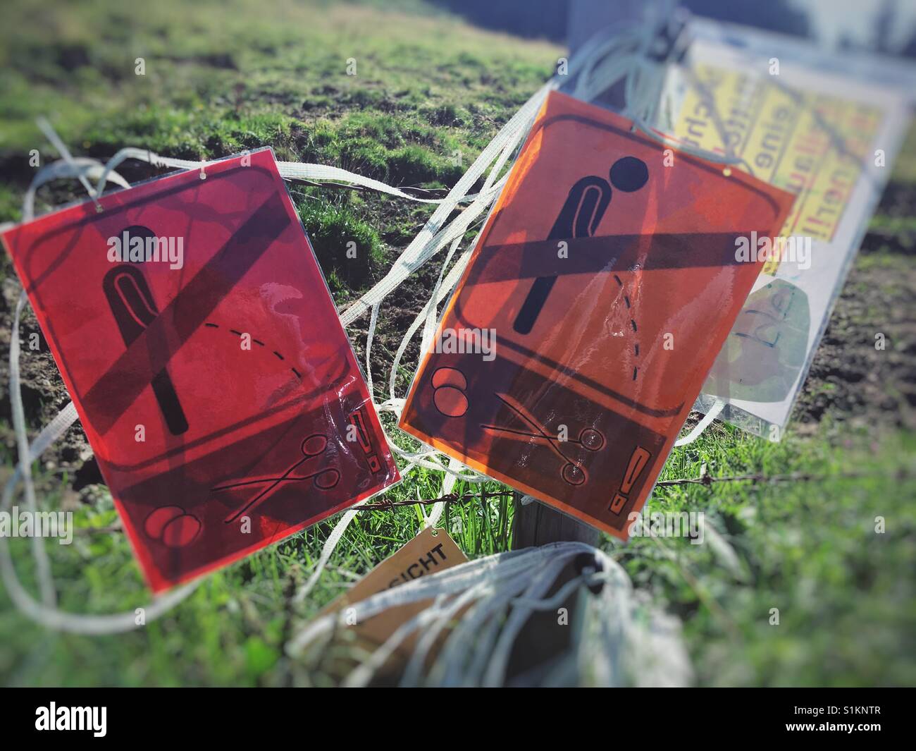 Warning sign against urinating Stock Photo - Alamy