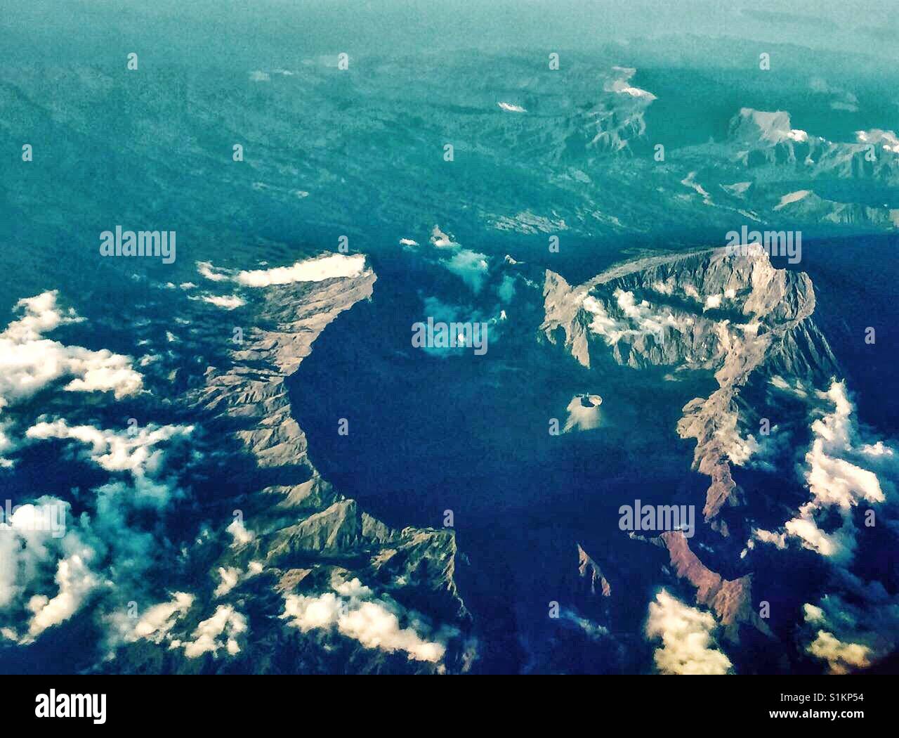 Volcano lying inside a volcano! Photo taken from cockpit at 35000ft ...