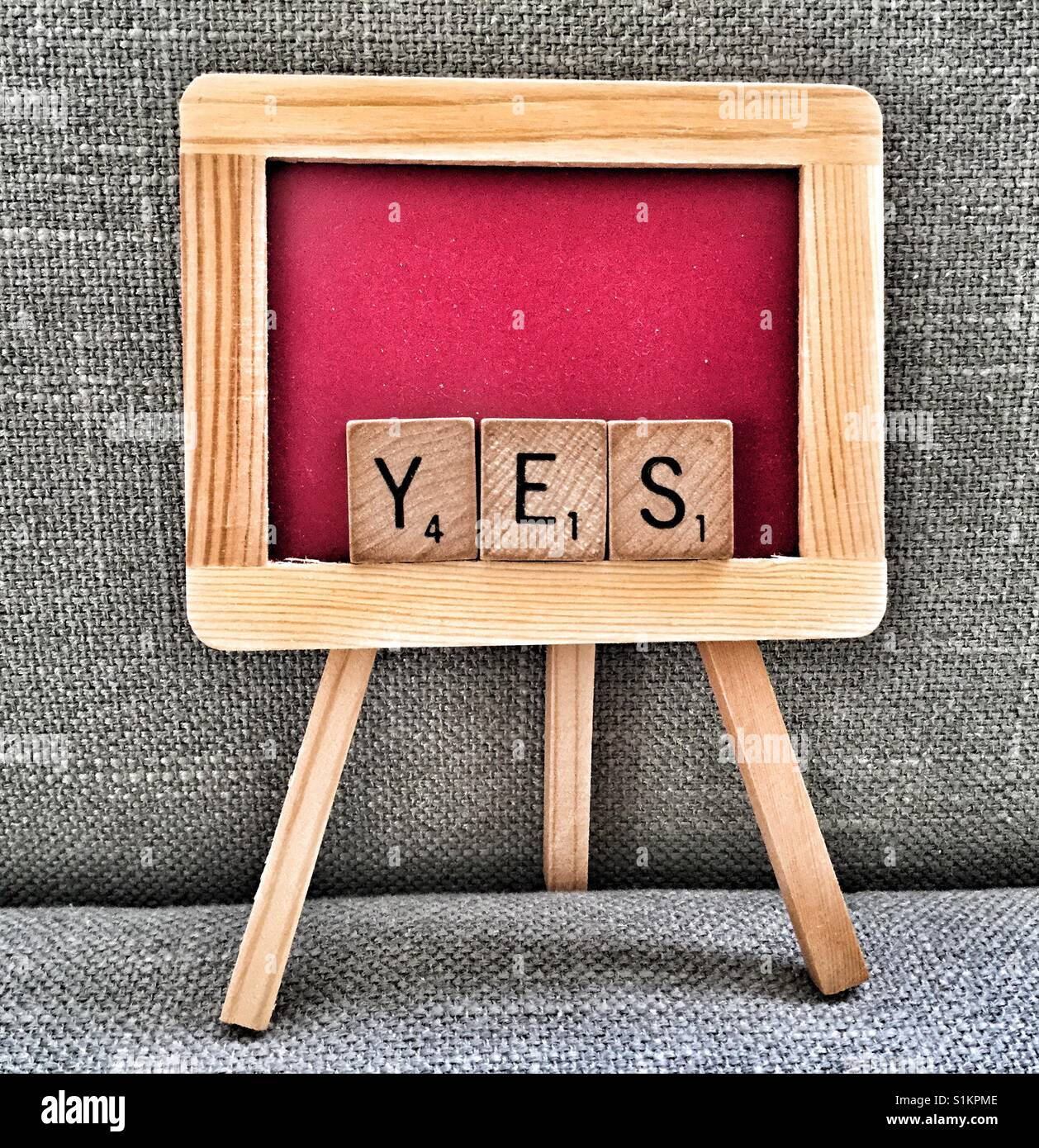 Miniature chalkboard spelling Yes Stock Photo - Alamy