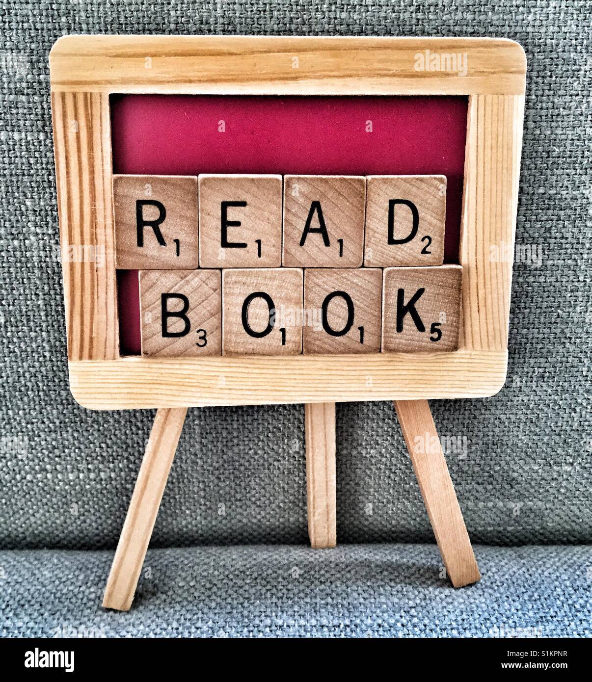 Miniature chalkboard spelling Read Book Stock Photo - Alamy