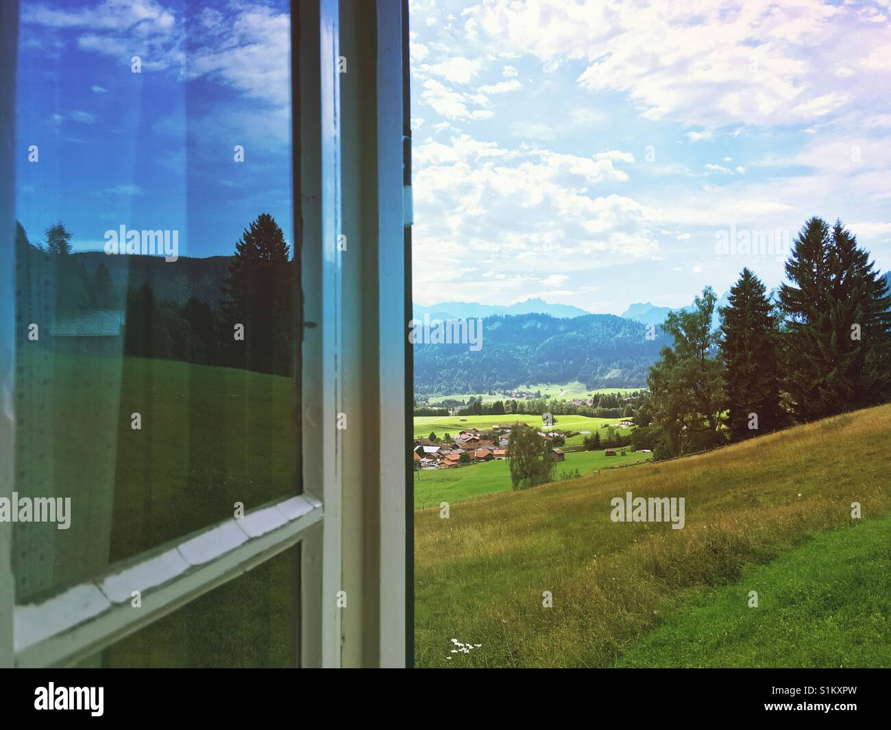 A Window opening to a valley in the German Alps, Oberallgäu, Germany ...