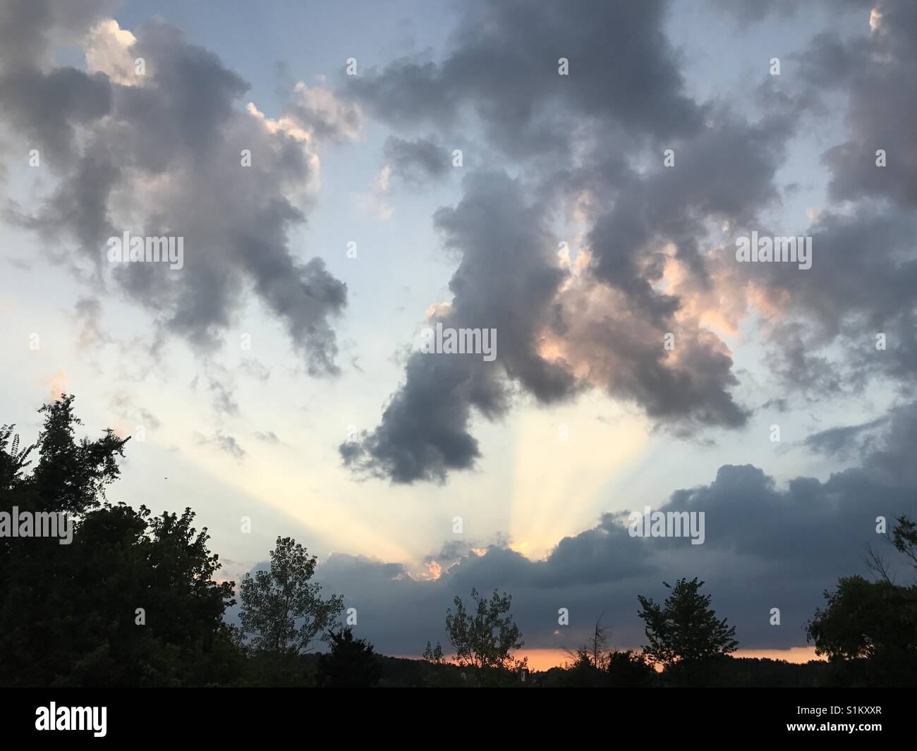 Cloudy dramatic sunset Stock Photo - Alamy