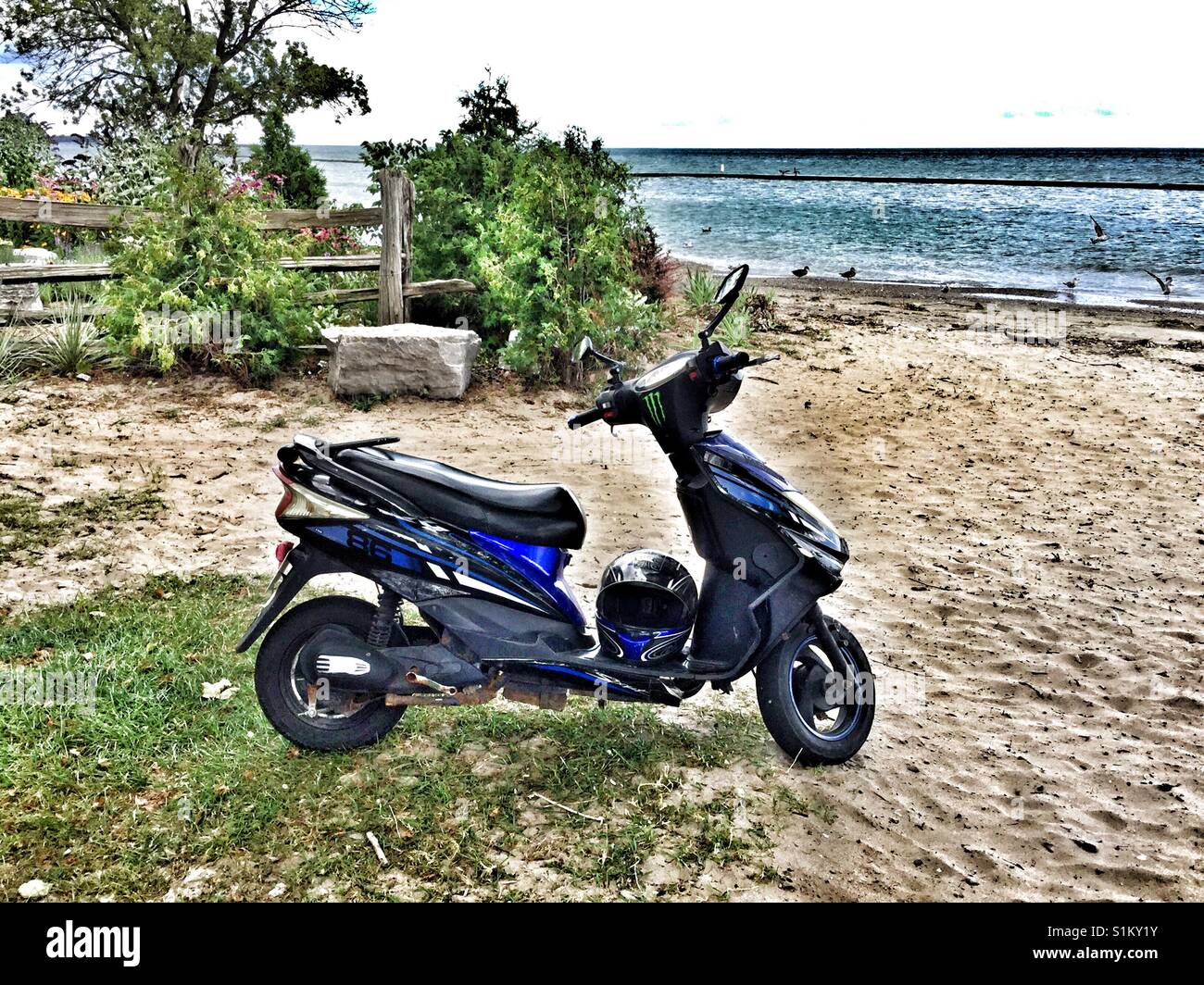 Moped on the beach hi-res stock photography and images - Alamy