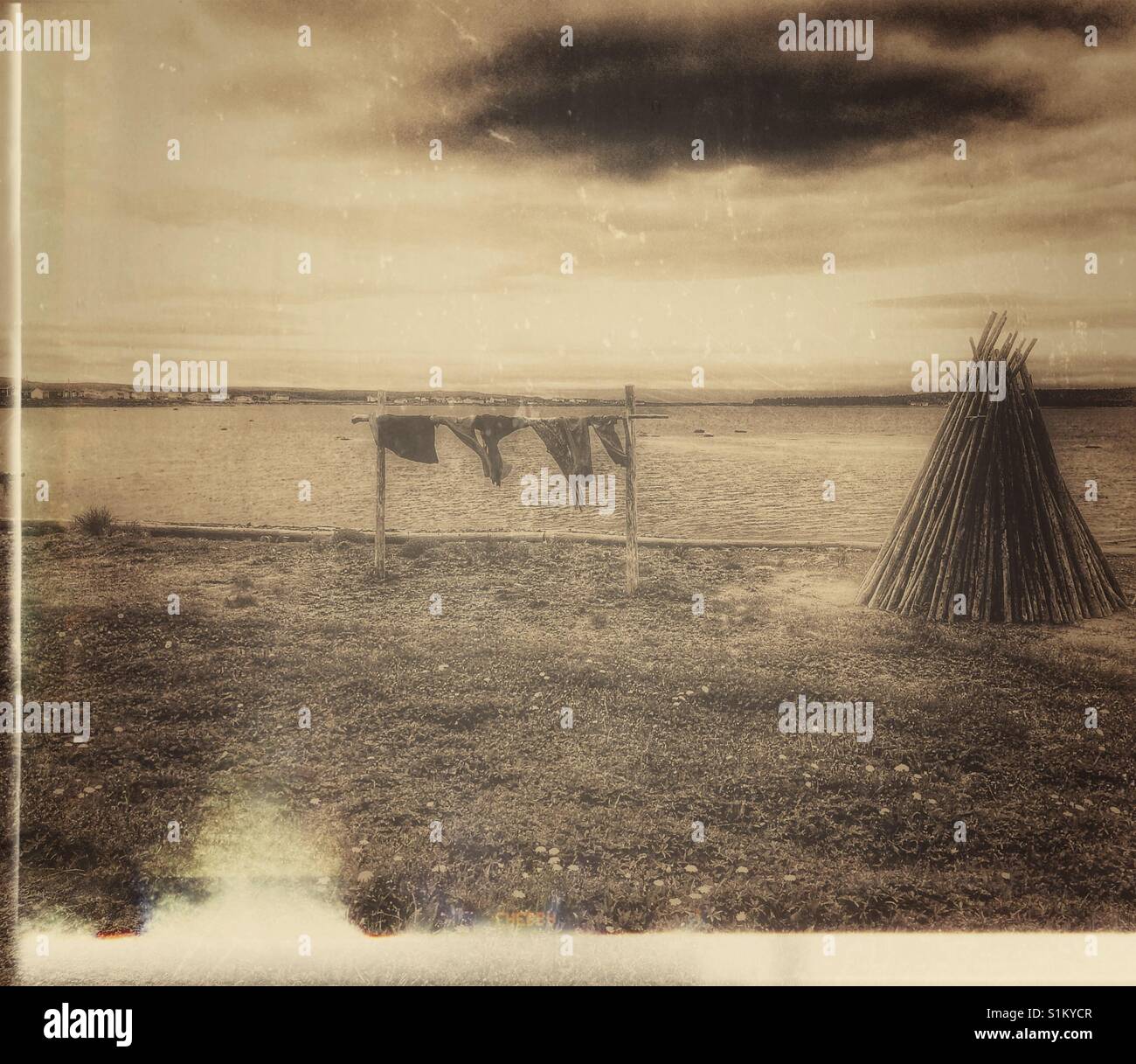 Wigwam made of tree branches and washing line, Newfoundland, Canada ...