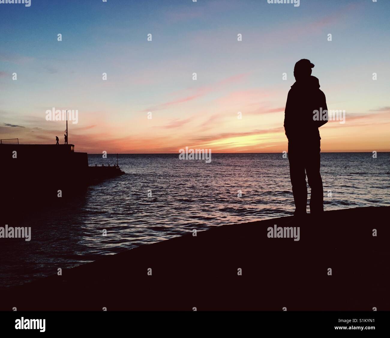 Watching sunset over sea hi-res stock photography and images - Alamy