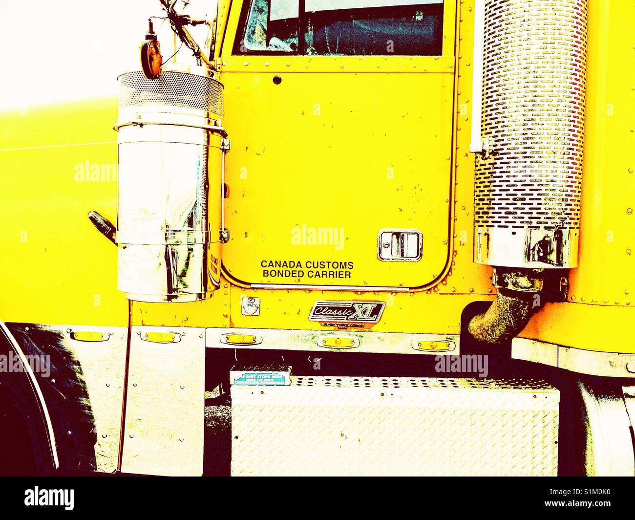 Drivers cab of a yellow American Classic XL Freightliner truck Stock ...