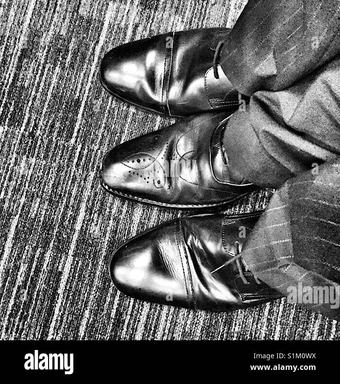 Black legs and feet Black and White Stock Photos & Images - Alamy