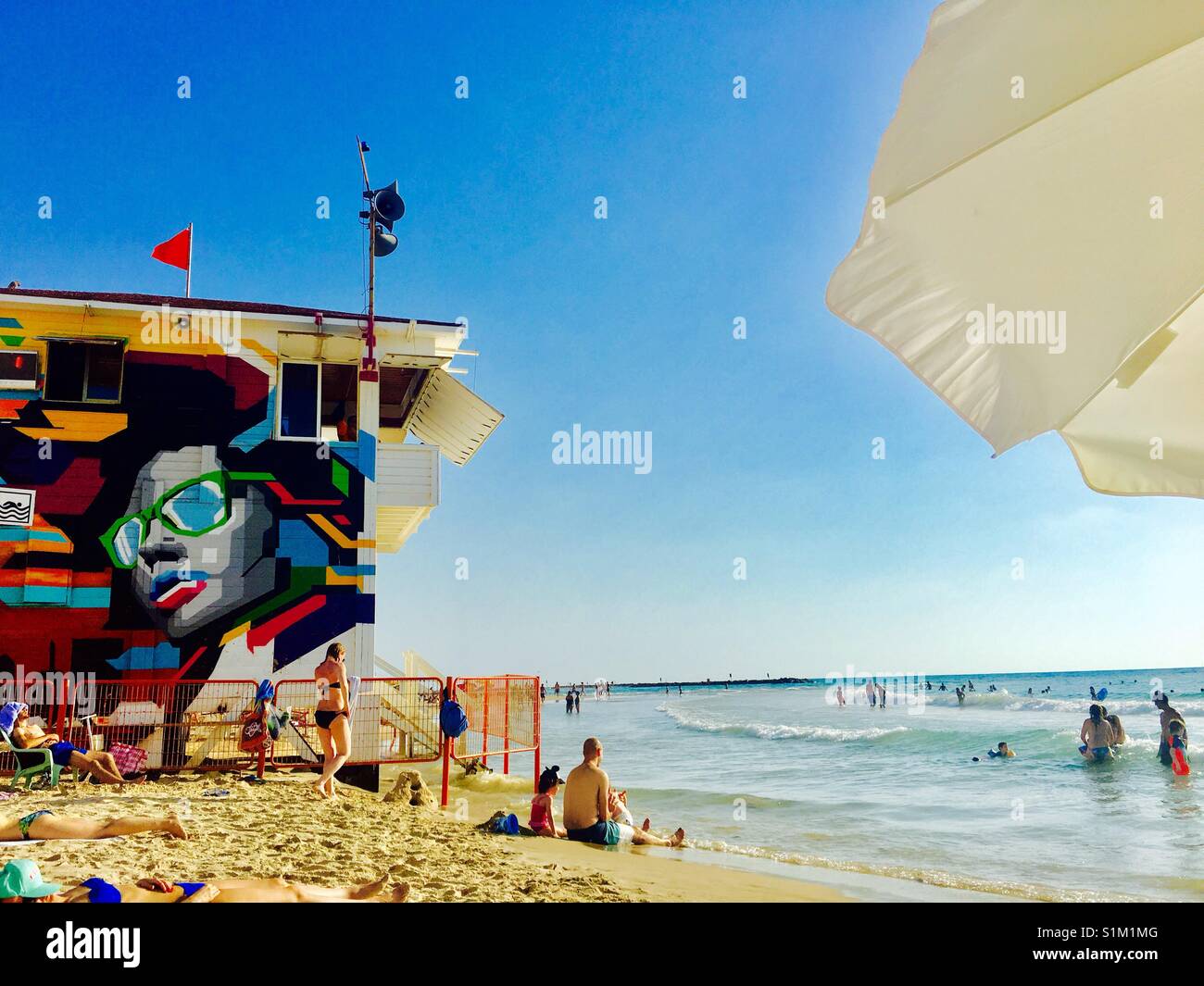 A sunny day on the soft sand on frishman beach in tel aviv Stock Photo ...